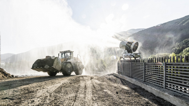 Dust abatement techniques with water mist cannons