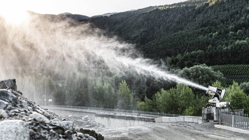 Dust abatement techniques with water mist cannons